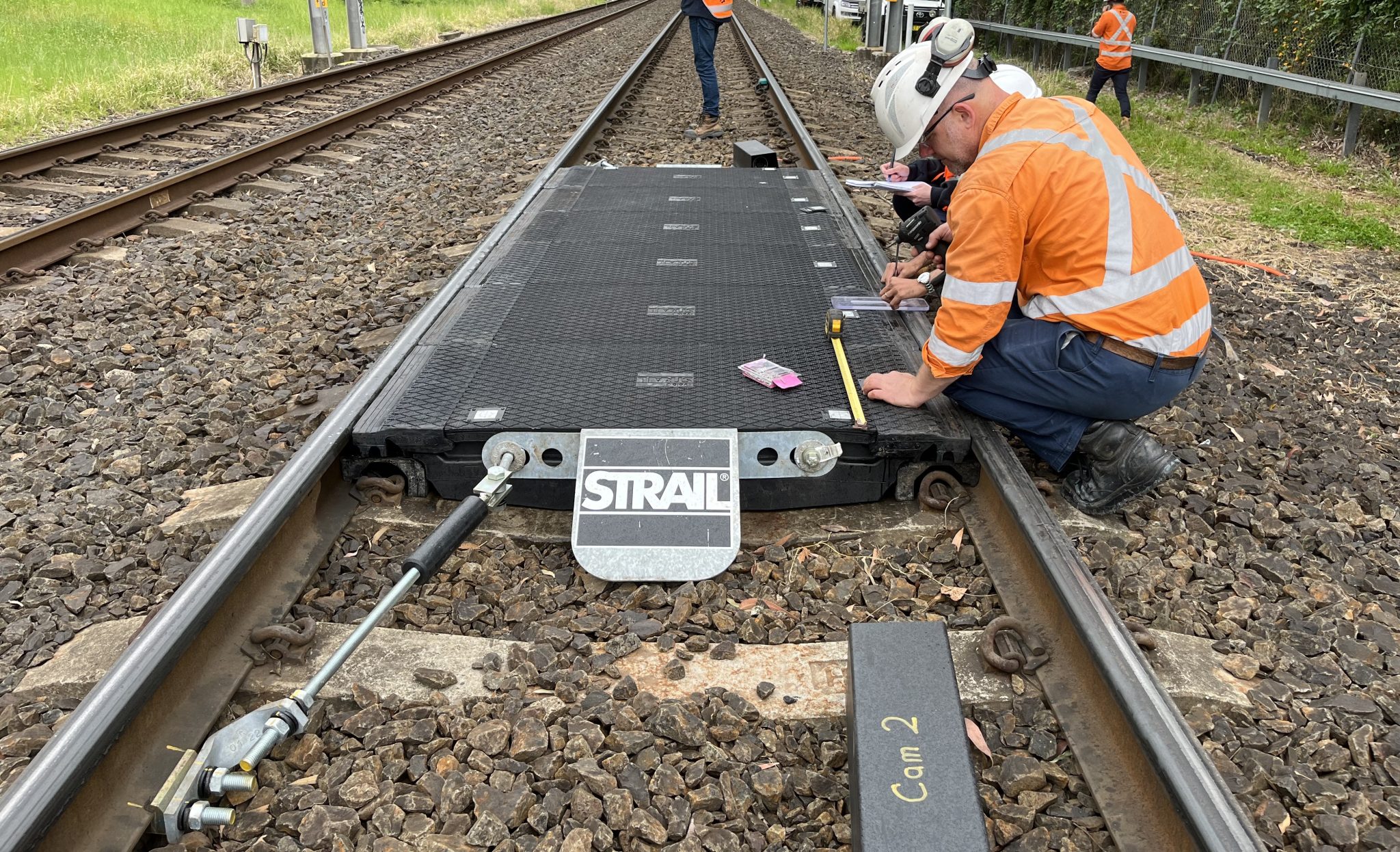 Bellambi rolls out the rubber panels to make rail level crossing safer ...