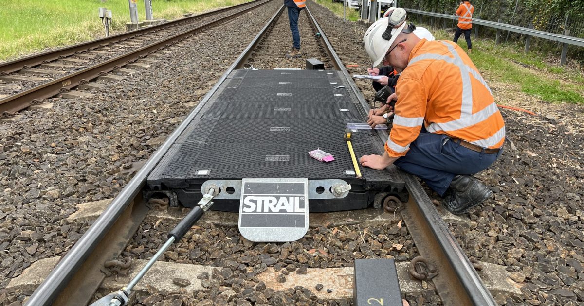 Bellambi rolls out the rubber panels to make rail level crossing safer ...